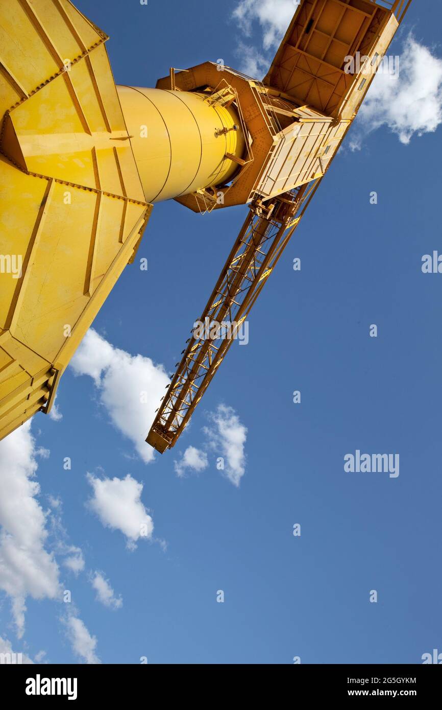 Blue yellow port crane hi-res stock photography and images - Alamy