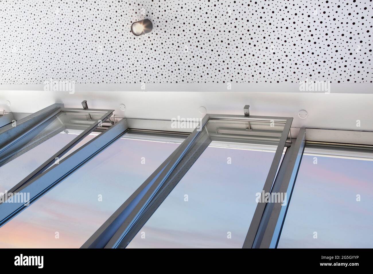 Aluminum bellows windows inside a house Stock Photo - Alamy