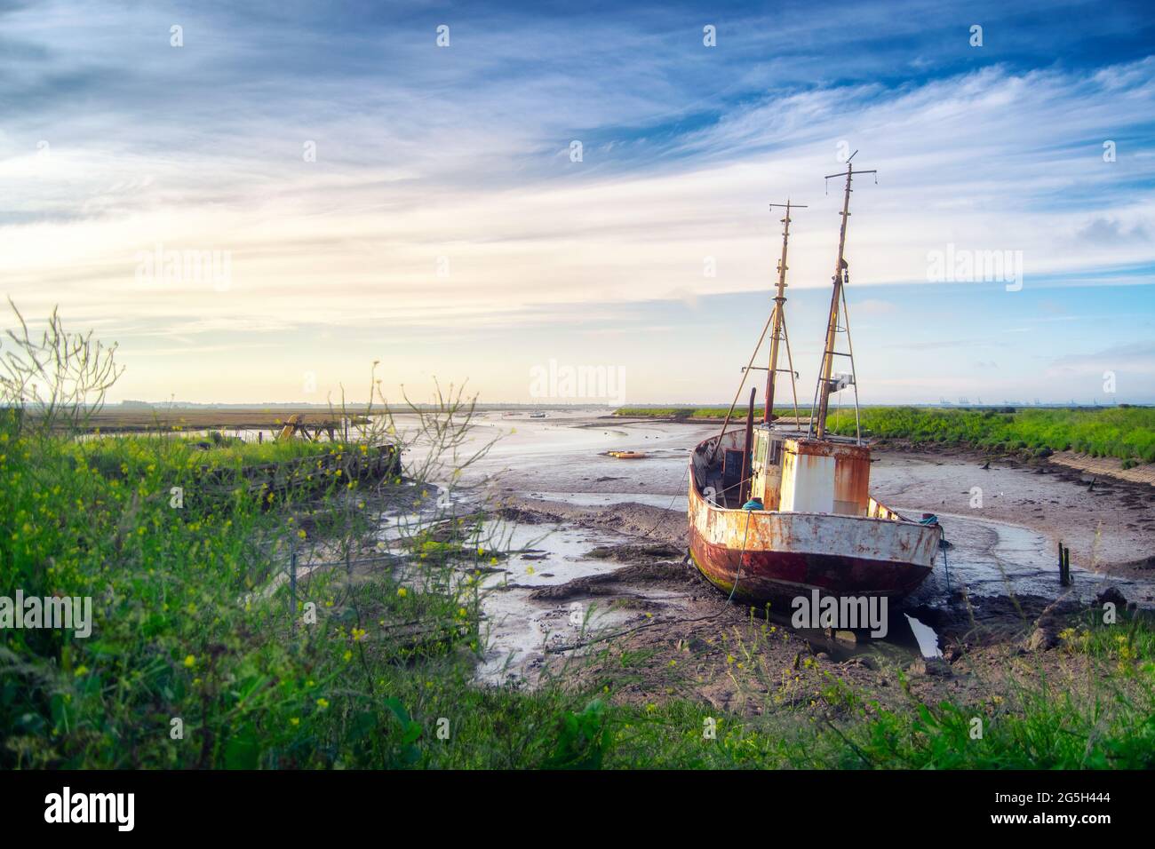 Abandoned old rusty shiip on the shore Stock Photo - Alamy