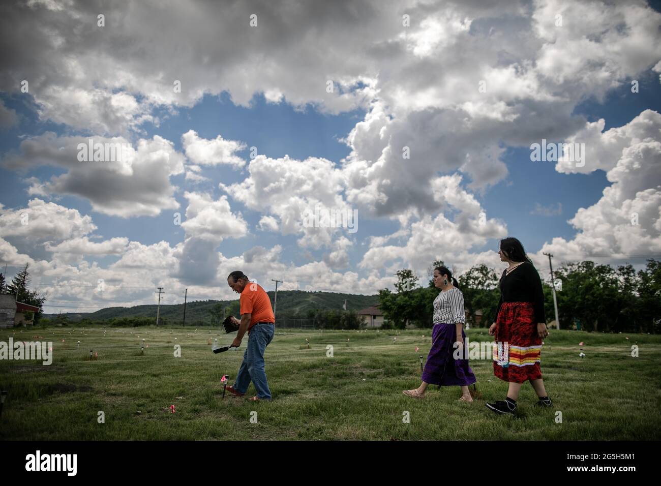 Saskatchewan, Canada. 27th June, 2021. Members of the Cowessess First ...