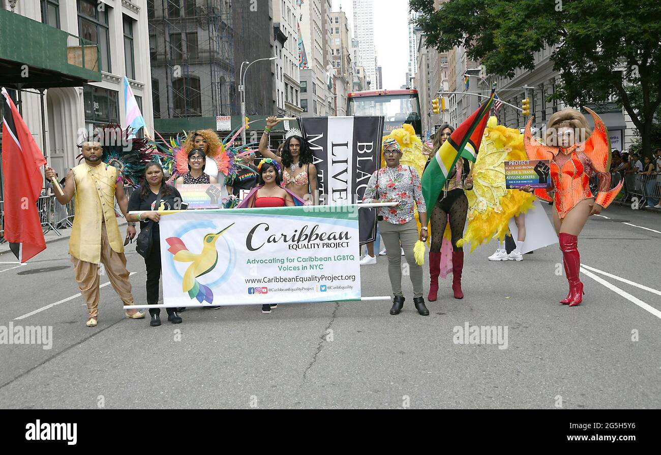 Marchers attend the NYC Pride March on June 27, 2021 on 5th Avenue and ...