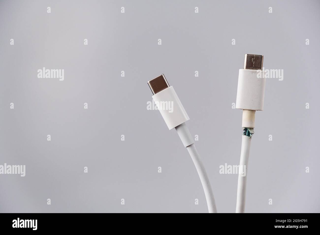 Close-up of a torn and intact type C mobile phone charging wire Stock ...