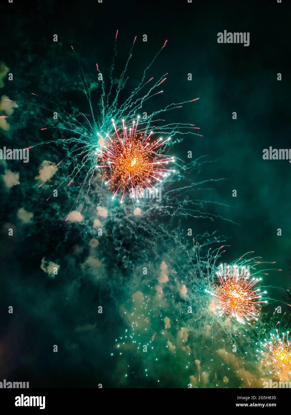 Beautiful festive fireworks at night Stock Photo - Alamy