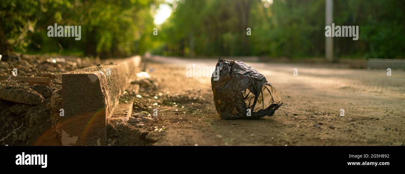 plastic garbage on the ground outdoor in the street Stock Photo - Alamy
