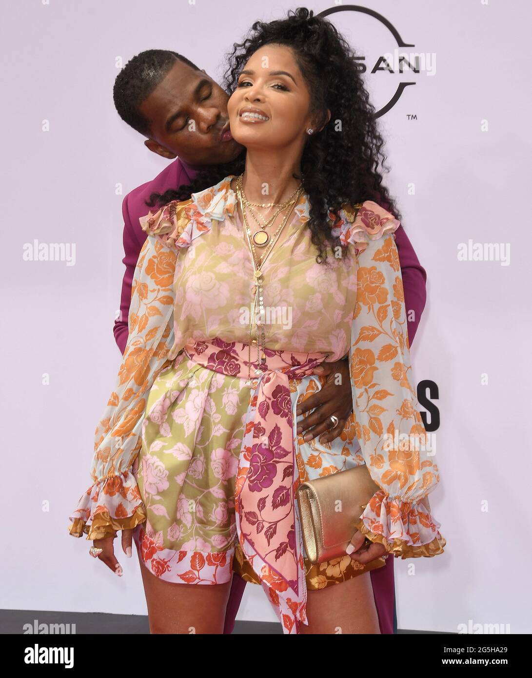 (L-R) Kirk Franklin and Tammy Collins arrives at the BET Awards 2021 ...