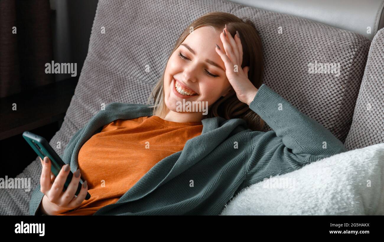 Woman and texting and laughing hi-res stock photography and images - Alamy