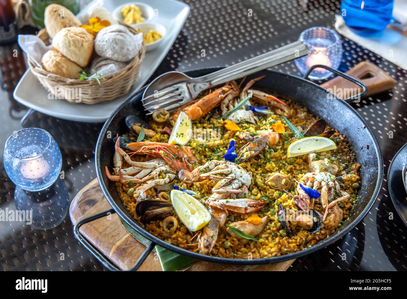 Spanish style Filipino food paella on the Table Stock Photo - Alamy
