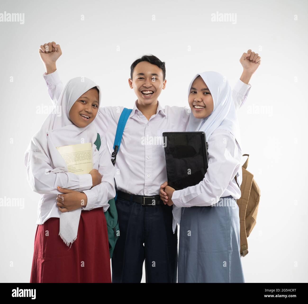 Wearing school uniforms hi-res stock photography and images - Alamy
