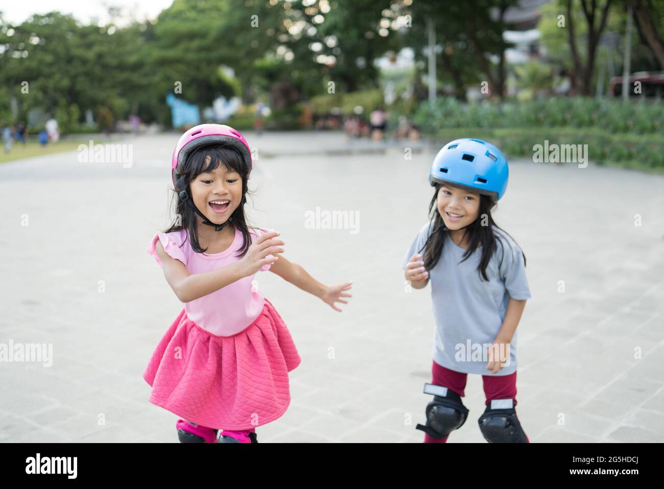asian girl going on her in-line skates Stock Photo - Alamy