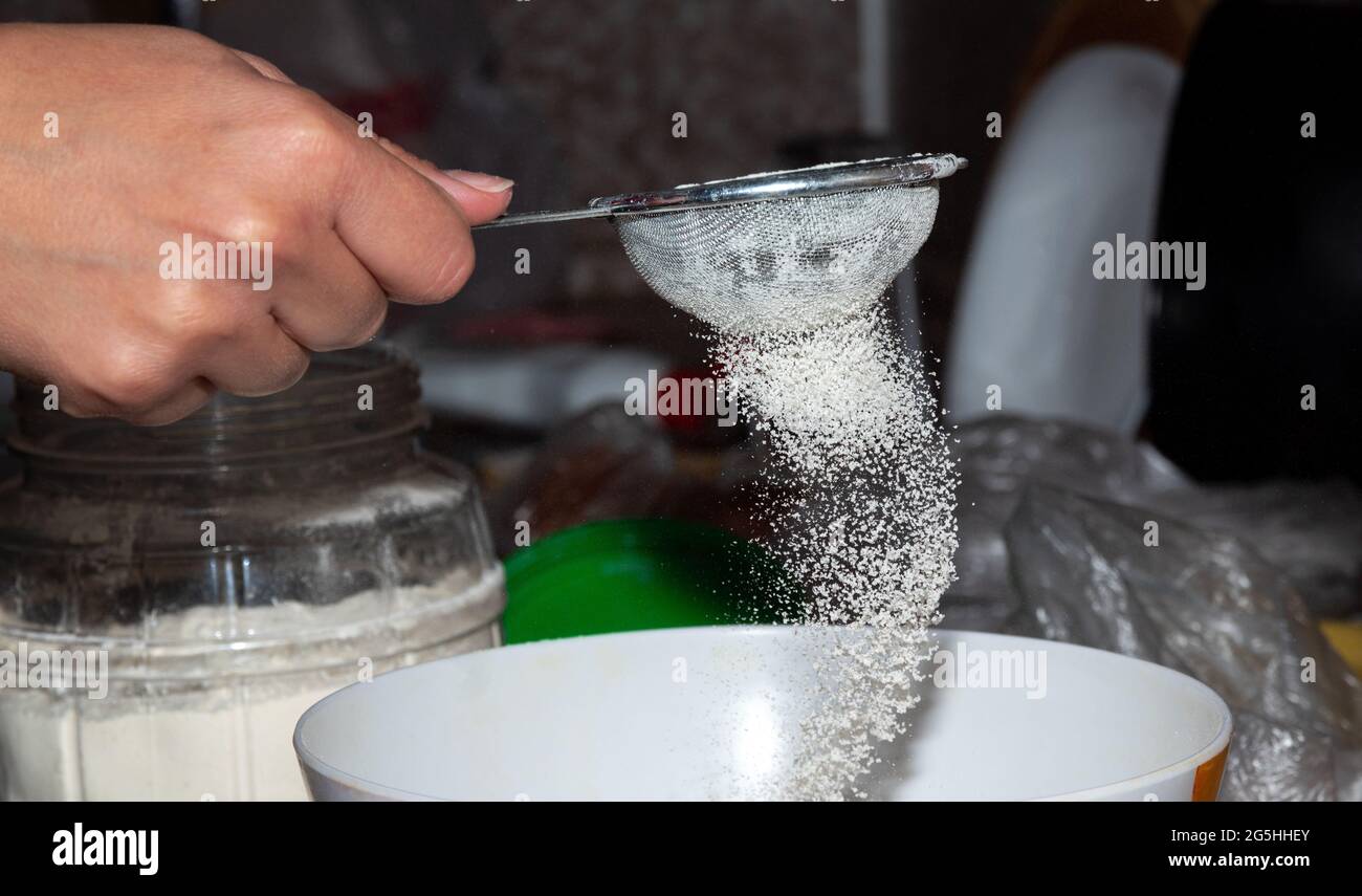 Sifting process hi-res stock photography and images - Alamy
