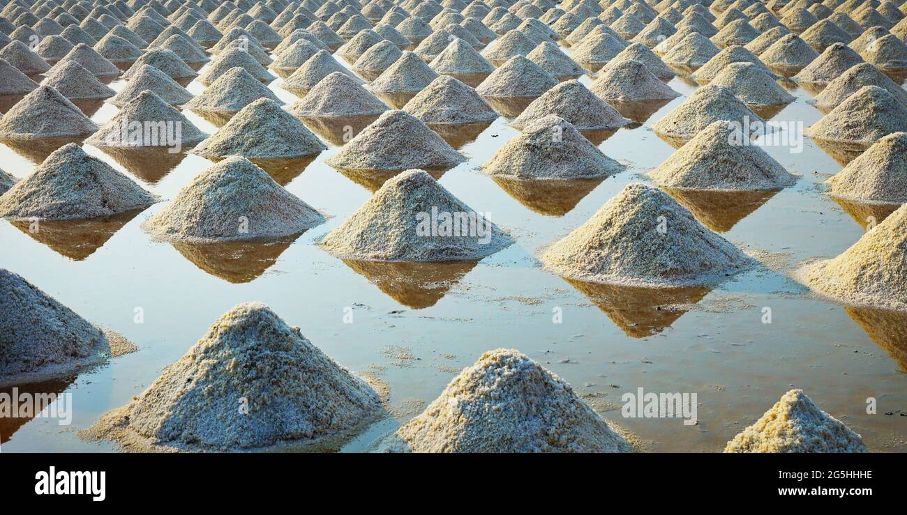 cone of salt in salt field at Ban Laem-Thailand Stock Photo - Alamy