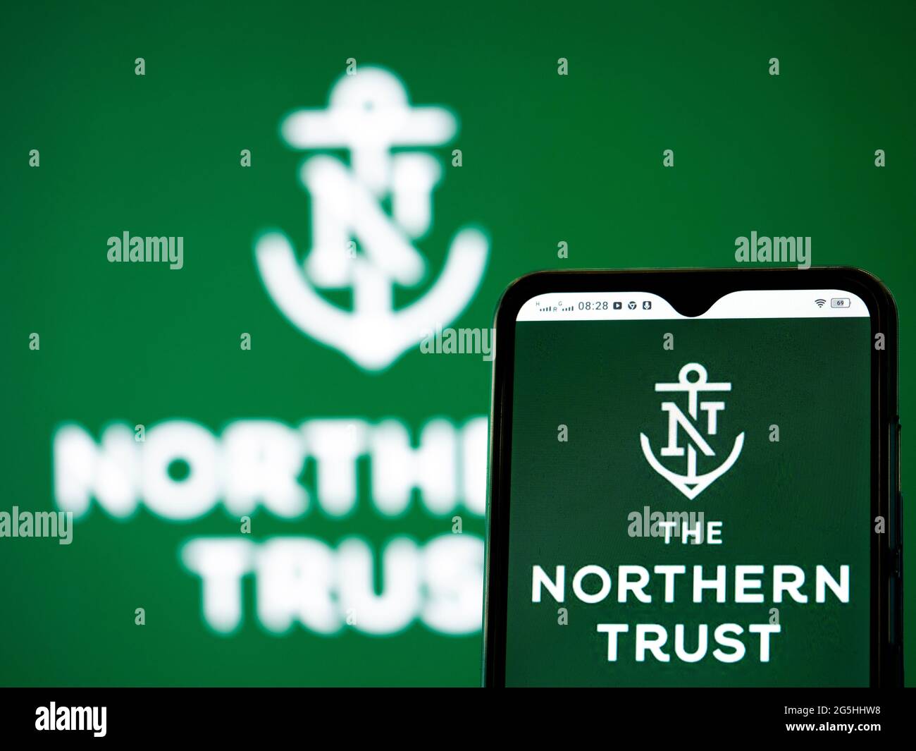 In this photo illustration a Northern Trust Corporation logo seen ...