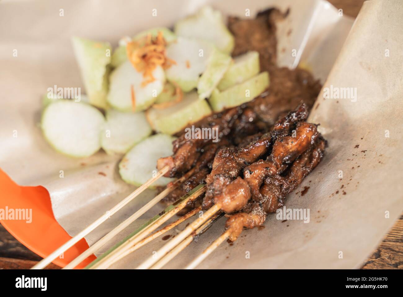 chicken satay skewer with rice cake Stock Photo - Alamy