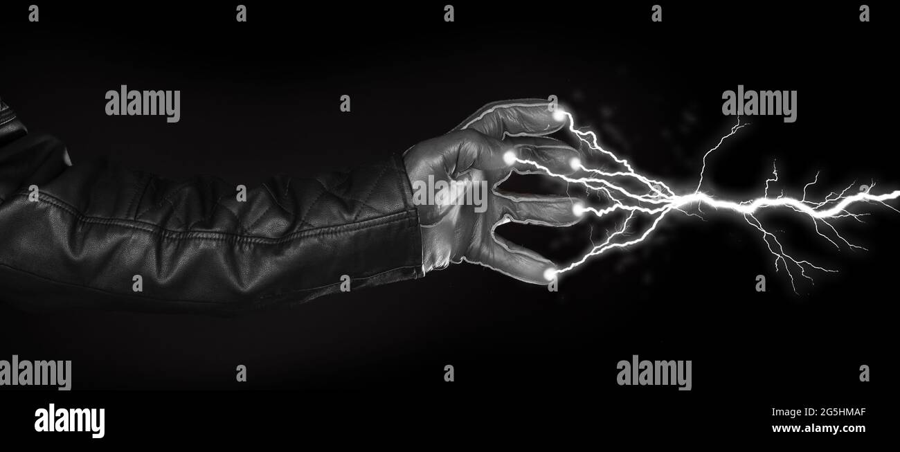 Hand shooting out a bolt of lightning - Dark and mysterious, isolated ...