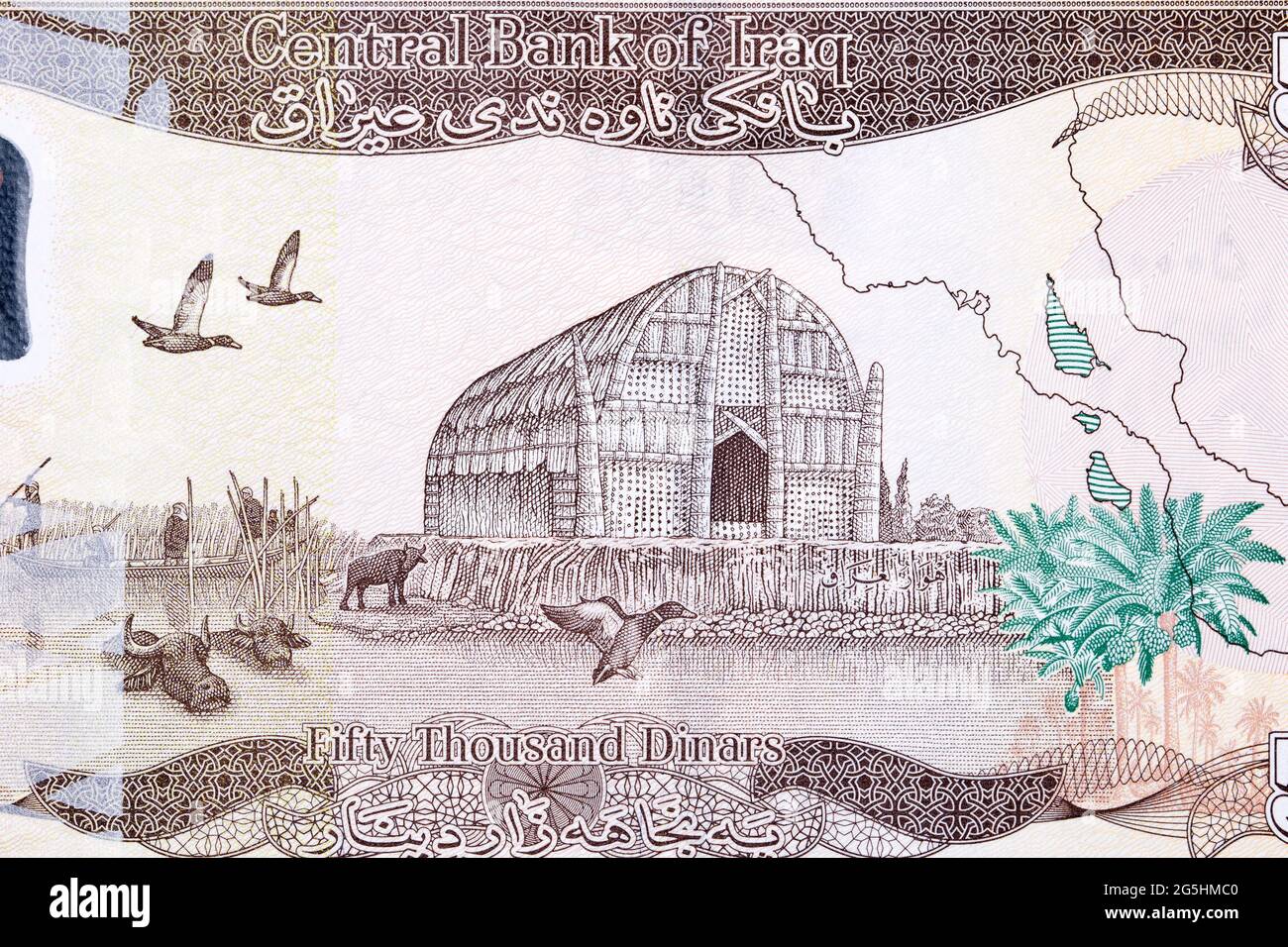 Traditional reed house of the Mesopotamian marshes from Iraqi money ...