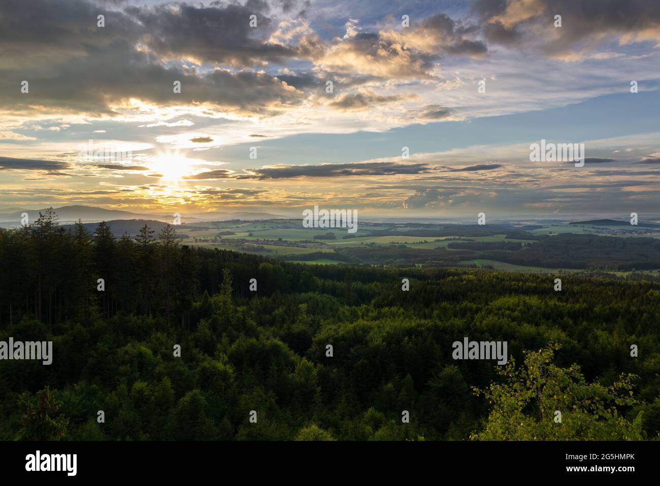 Summer forest Czech valley landscape with small vilage Besednice at ...