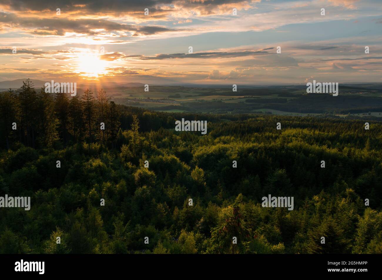 Summer forest Czech valley landscape with small vilage Besednice at ...