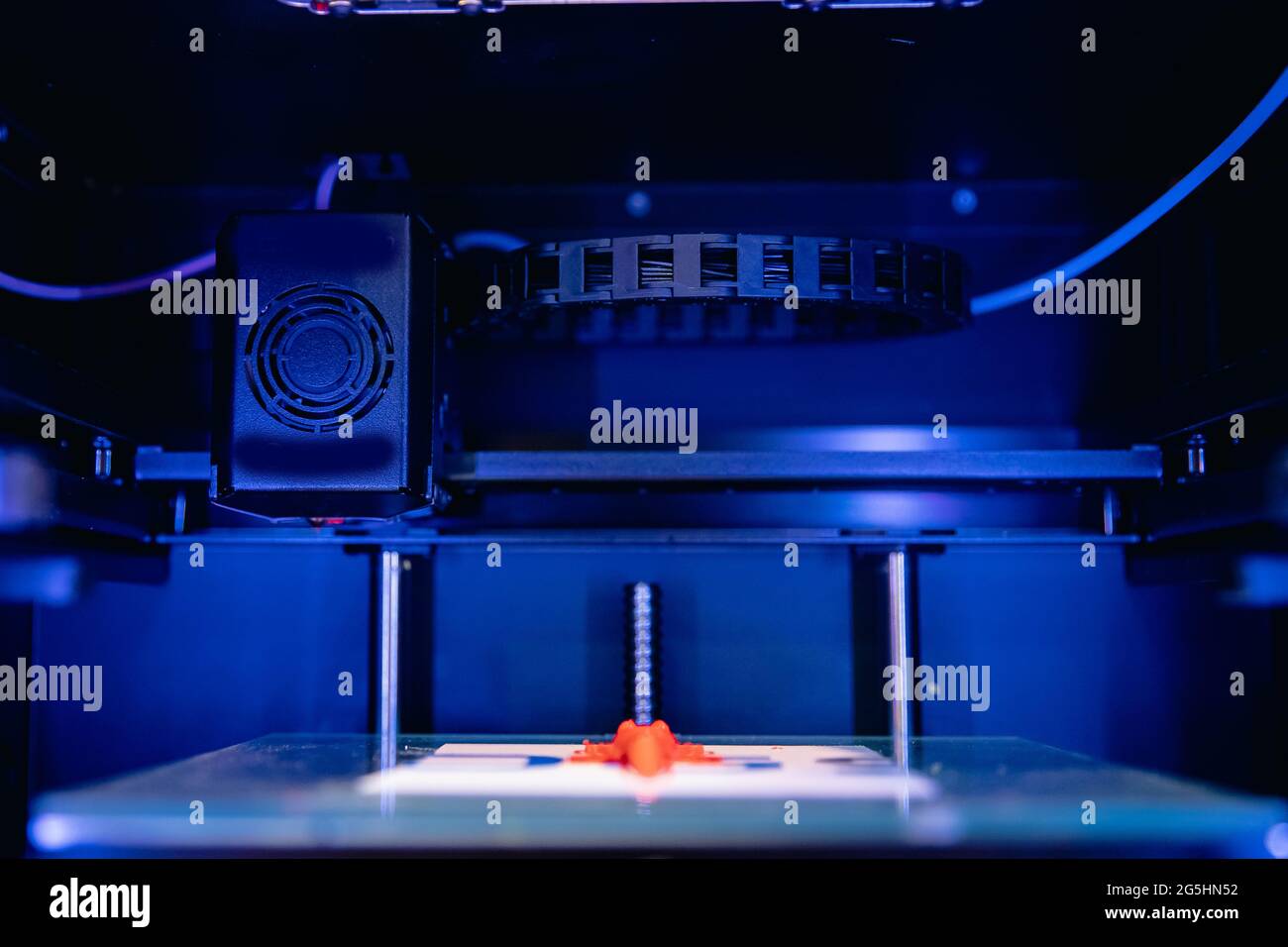 Blue color Modern 3D plastic printer printing figure close-up macro ...