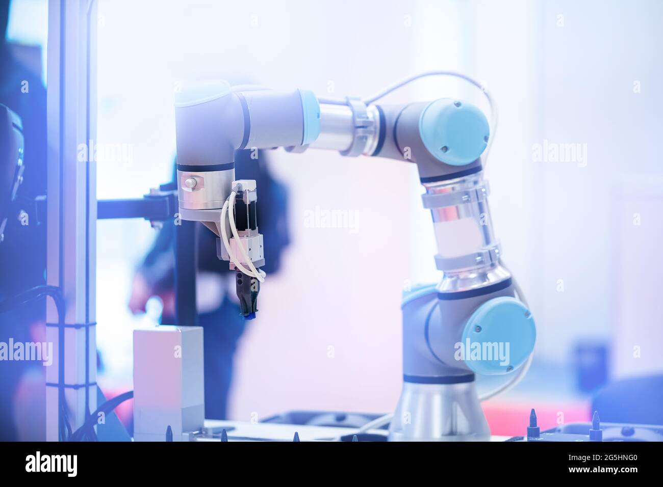 Automatic machine robot arm tool in manufacture factory. Concept smart Industrial 4.0 technology ...