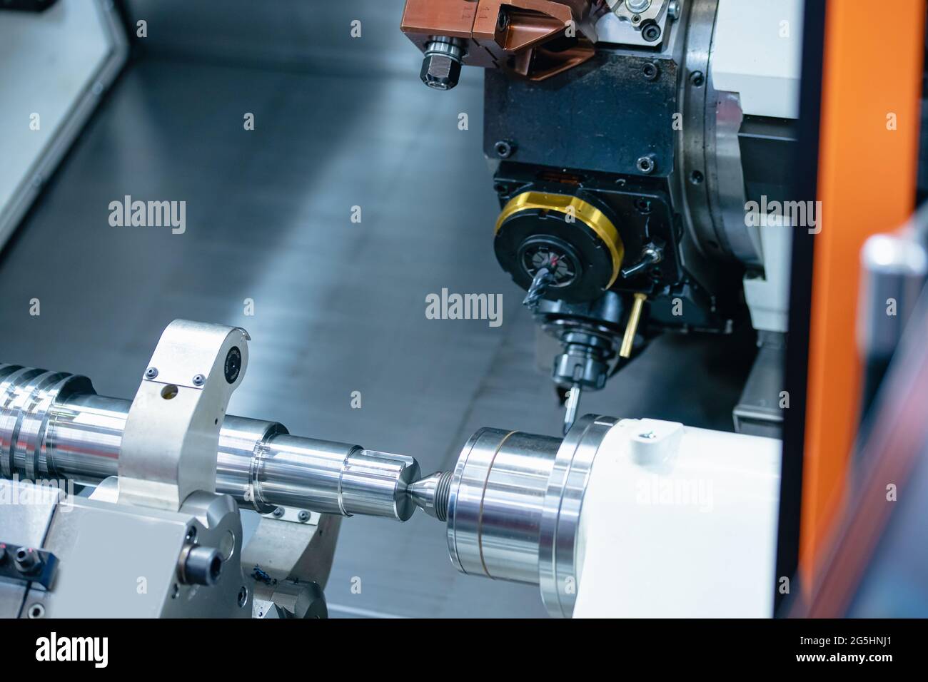 CNC turning drill milling factory processes steel billet. Metal machine ...