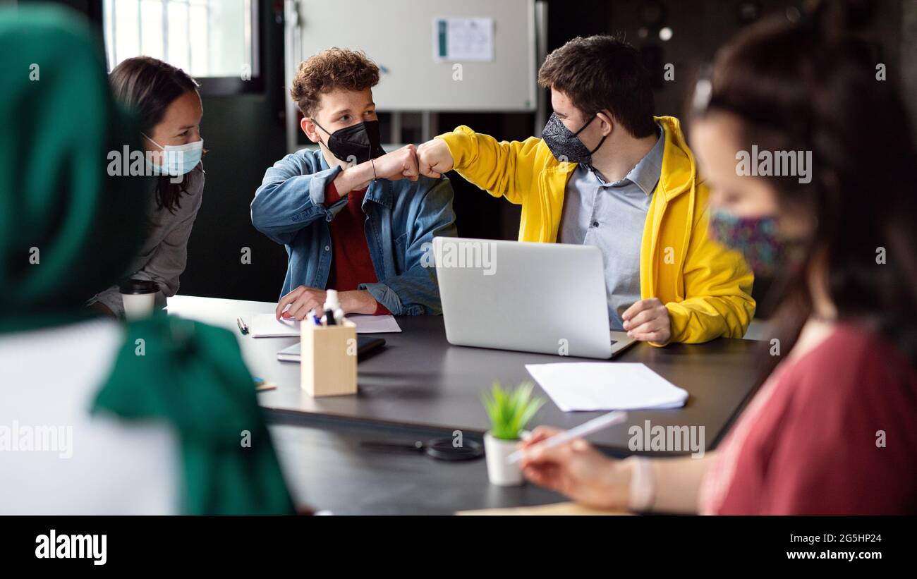 Group of people attending education class in community center ...