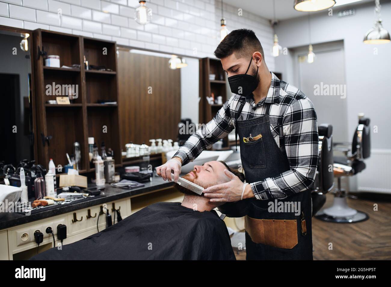 Man client visiting haidresser in barber shop, coronavirus and new ...