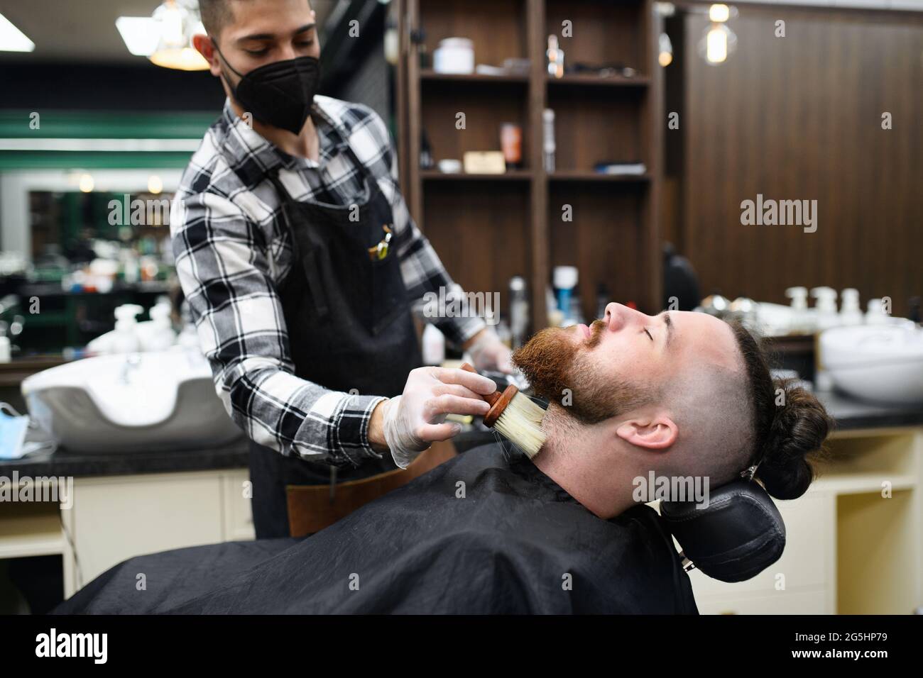 Man client visiting haidresser in barber shop, coronavirus and new ...