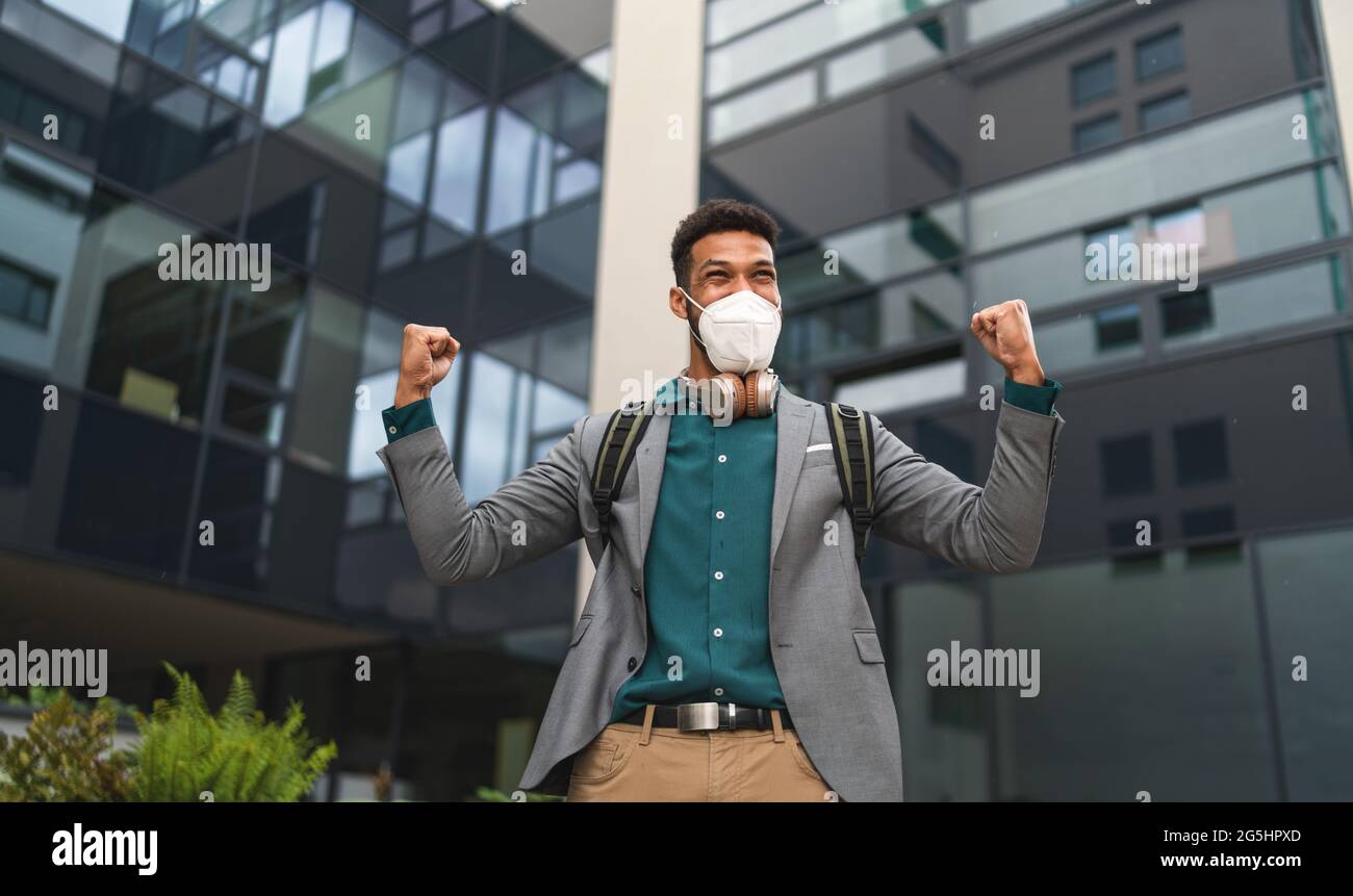 Excited young student expressing joy and happiness after passing exam ...