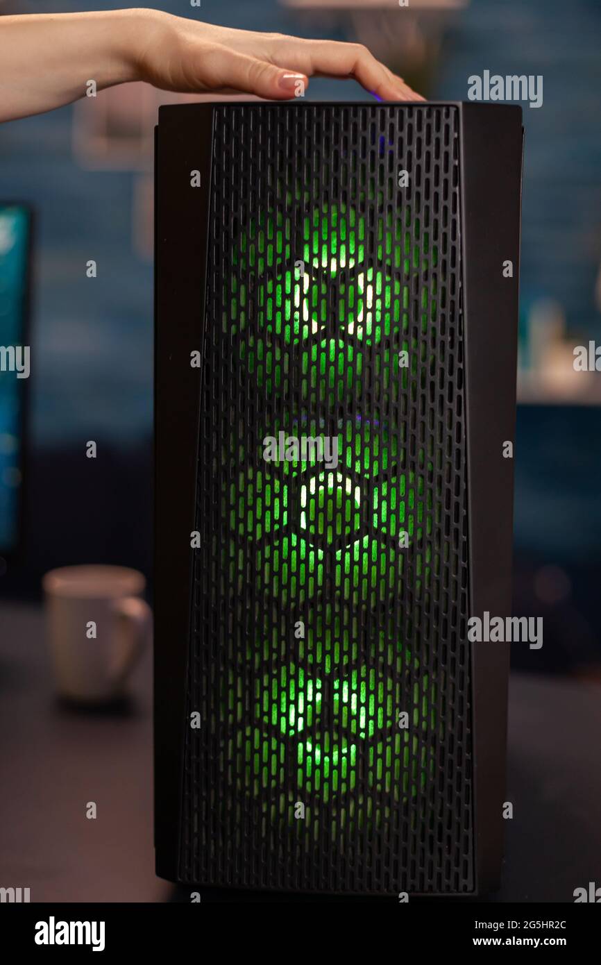 Professional esports gamer operating pc system, pressing on start ...