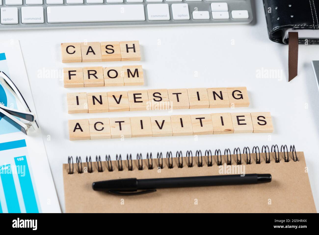 Cash from investing activities concept Stock Photo - Alamy