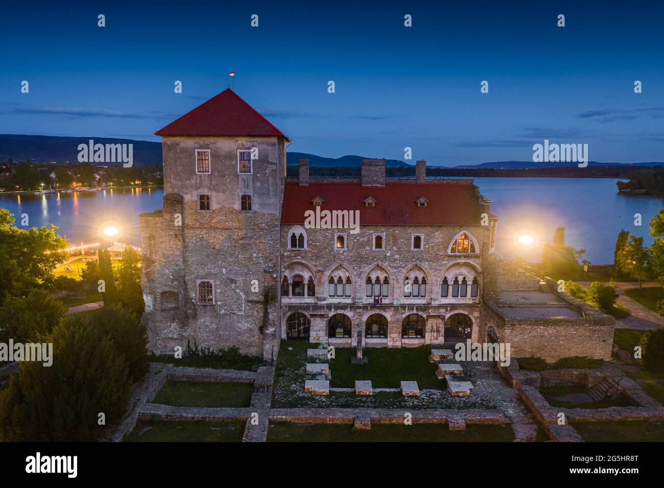 Tata, Hungary - Aerial view of the beautiful illuminated Castle of Tata ...