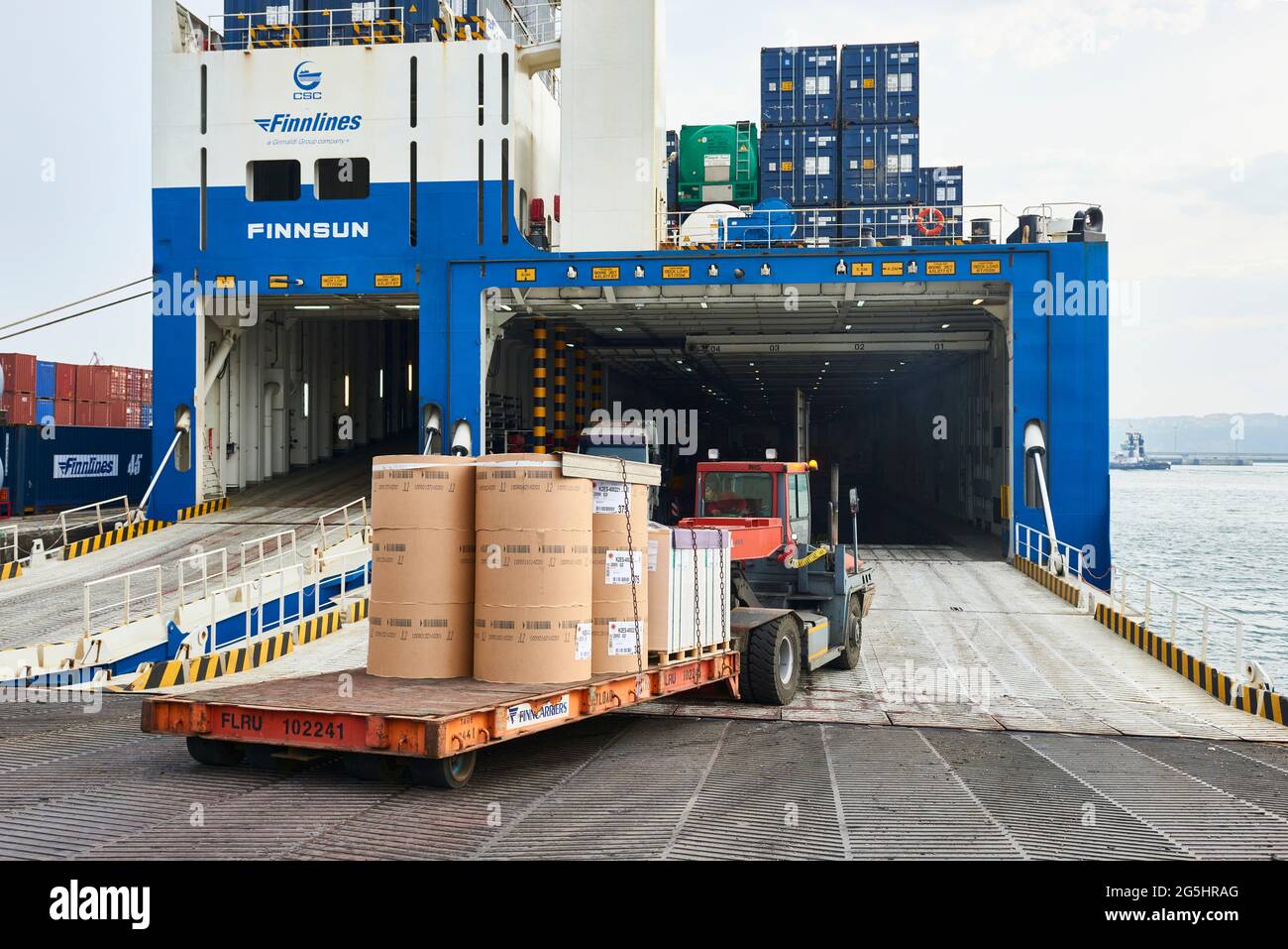 Lorry loading paper rolls to the vessel in the Port of Bilbao, Biscay ...