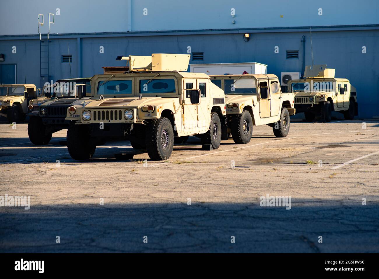Military Vehicles in a parking lot Stock Photo - Alamy