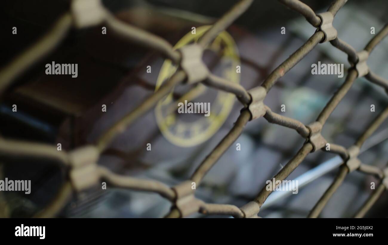 3d illustration - Old Brown Wooden Clock in Store Window Protected By ...