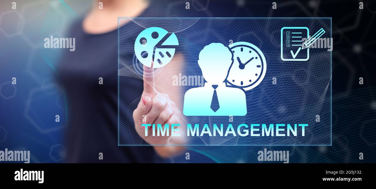 Woman touching a time management concept on a touch screen with her ...