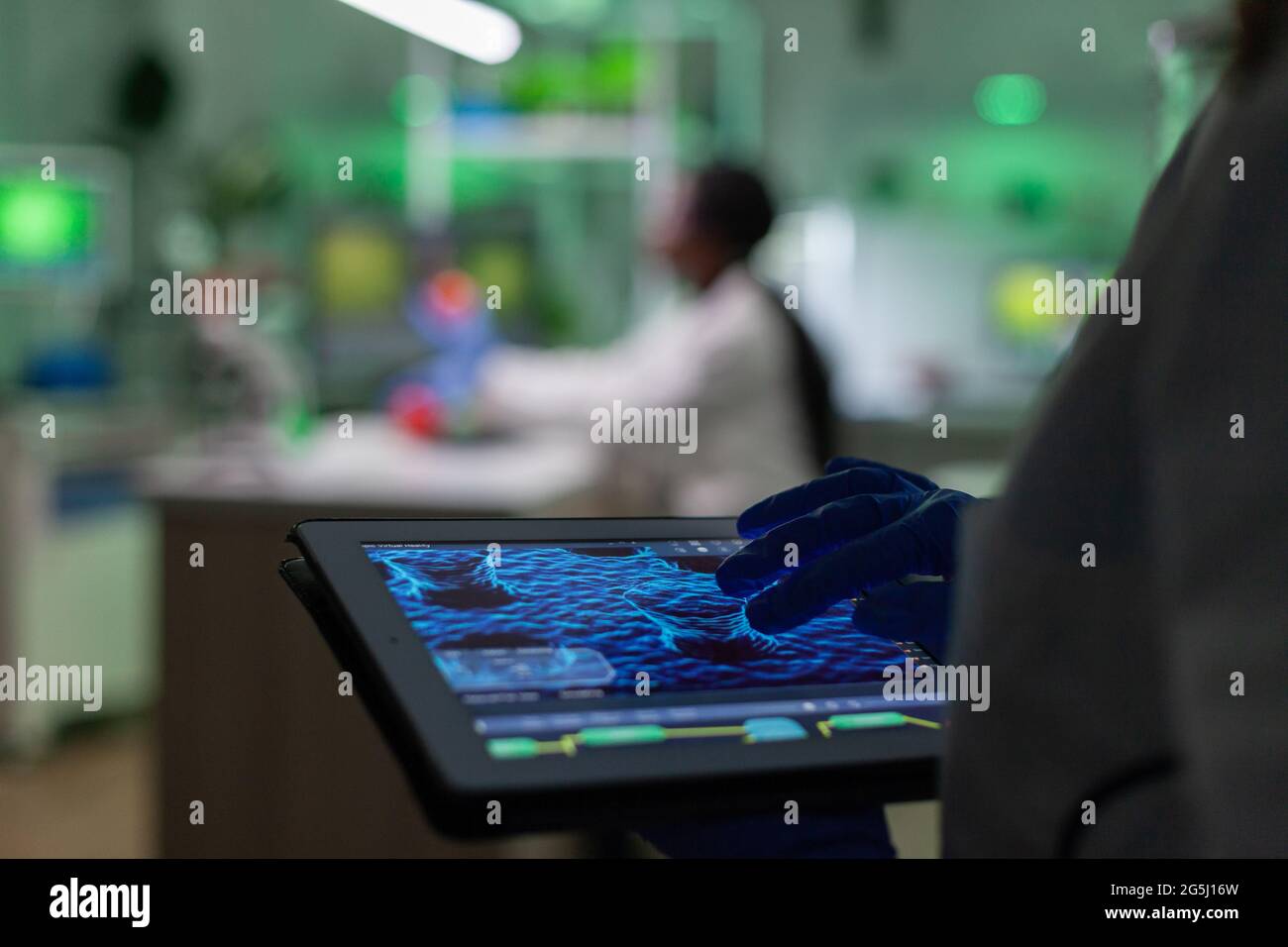 Scientist researcher doctor analyzing genetic mutation test using ...