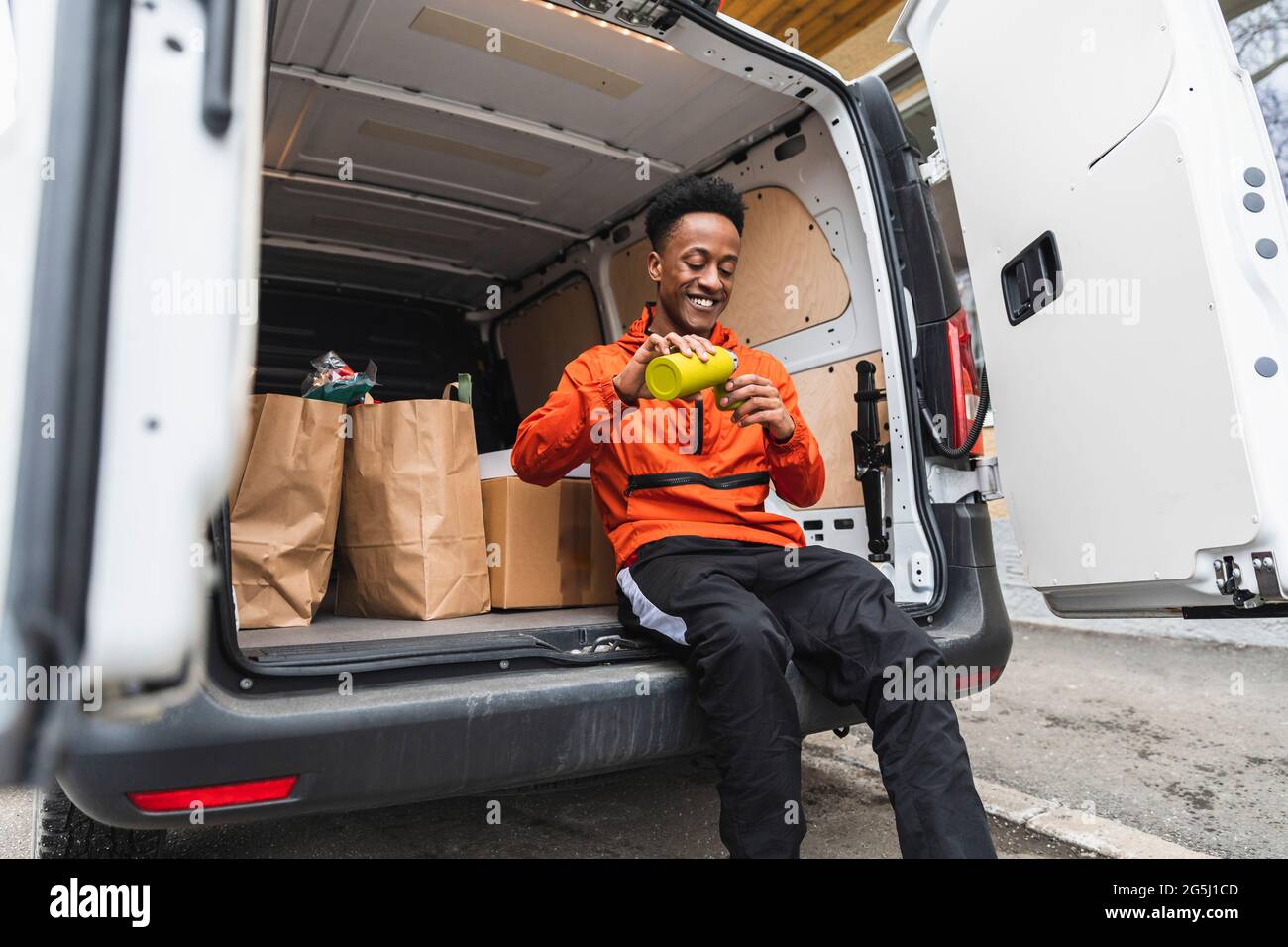 Courier delivery vehicle hi-res stock photography and images - Alamy