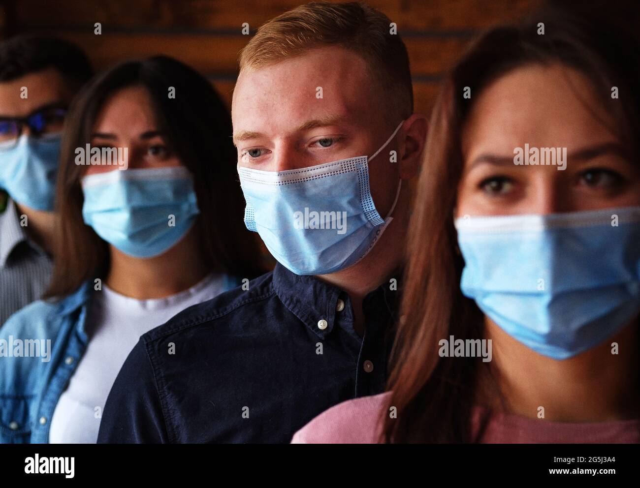 A group of young people wearing masks during the covid-19 pandemic - A ...
