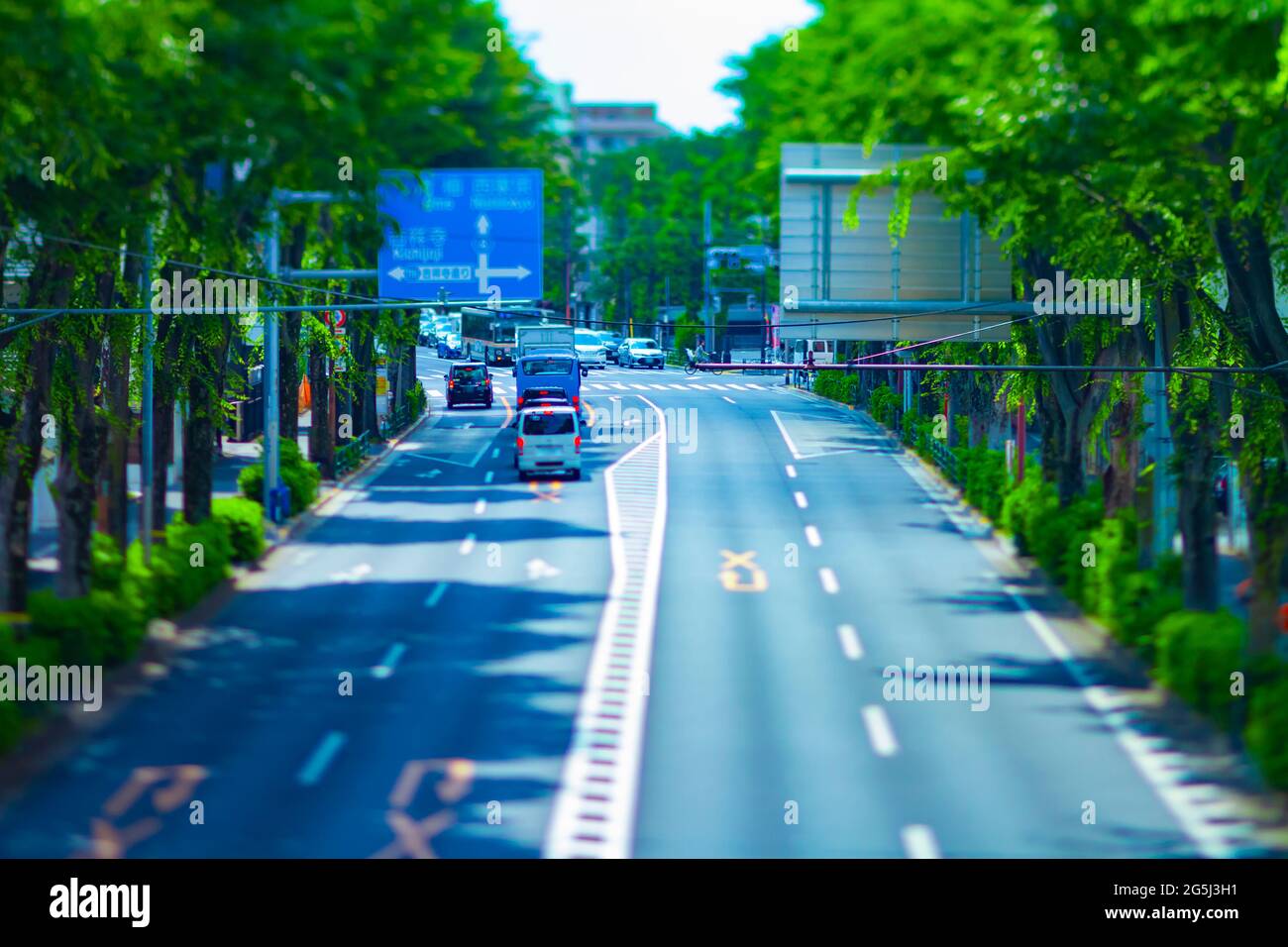 A miniature traffic jam at the avenue daytime in the downtown tiltshift ...