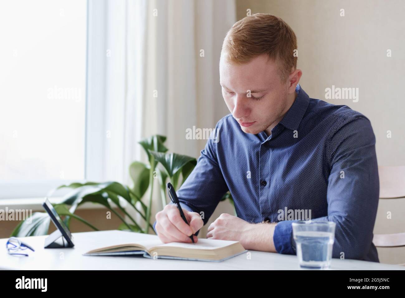 Video conference notebook desk adult hi-res stock photography and ...