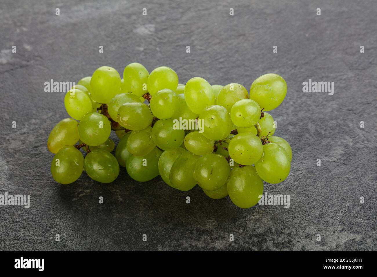 Ripe sweet green grape branch isolated Stock Photo - Alamy