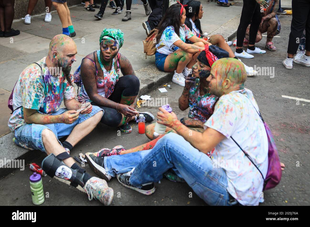 Revellers enjoy J'ouvert morning with face paint and colour powder ...