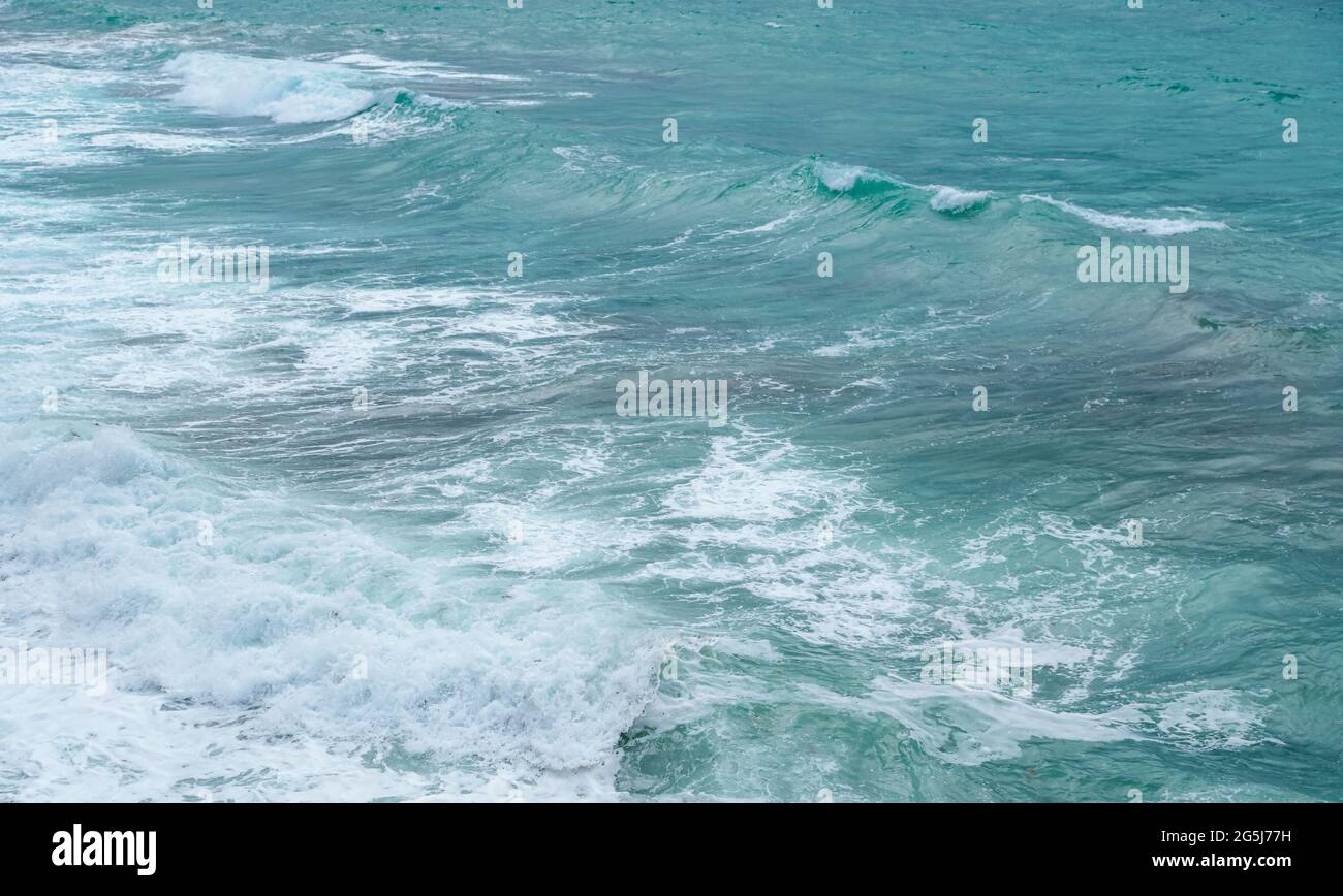 Beautiful view of ocean waves and a fantastic rocky shore, Sea patterns ...