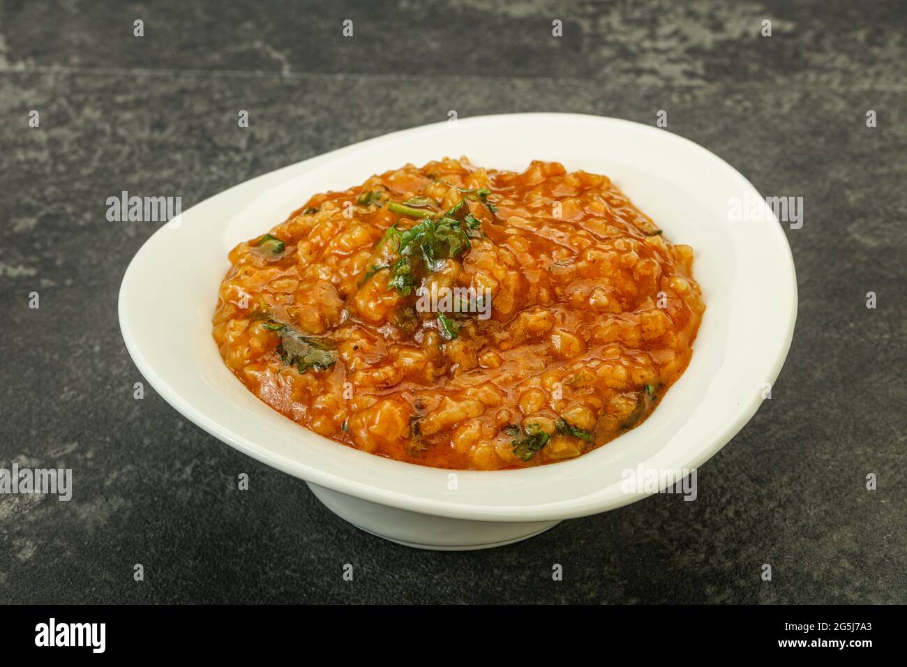Traditional Georgian Kharcho soup with meat and spices Stock Photo - Alamy