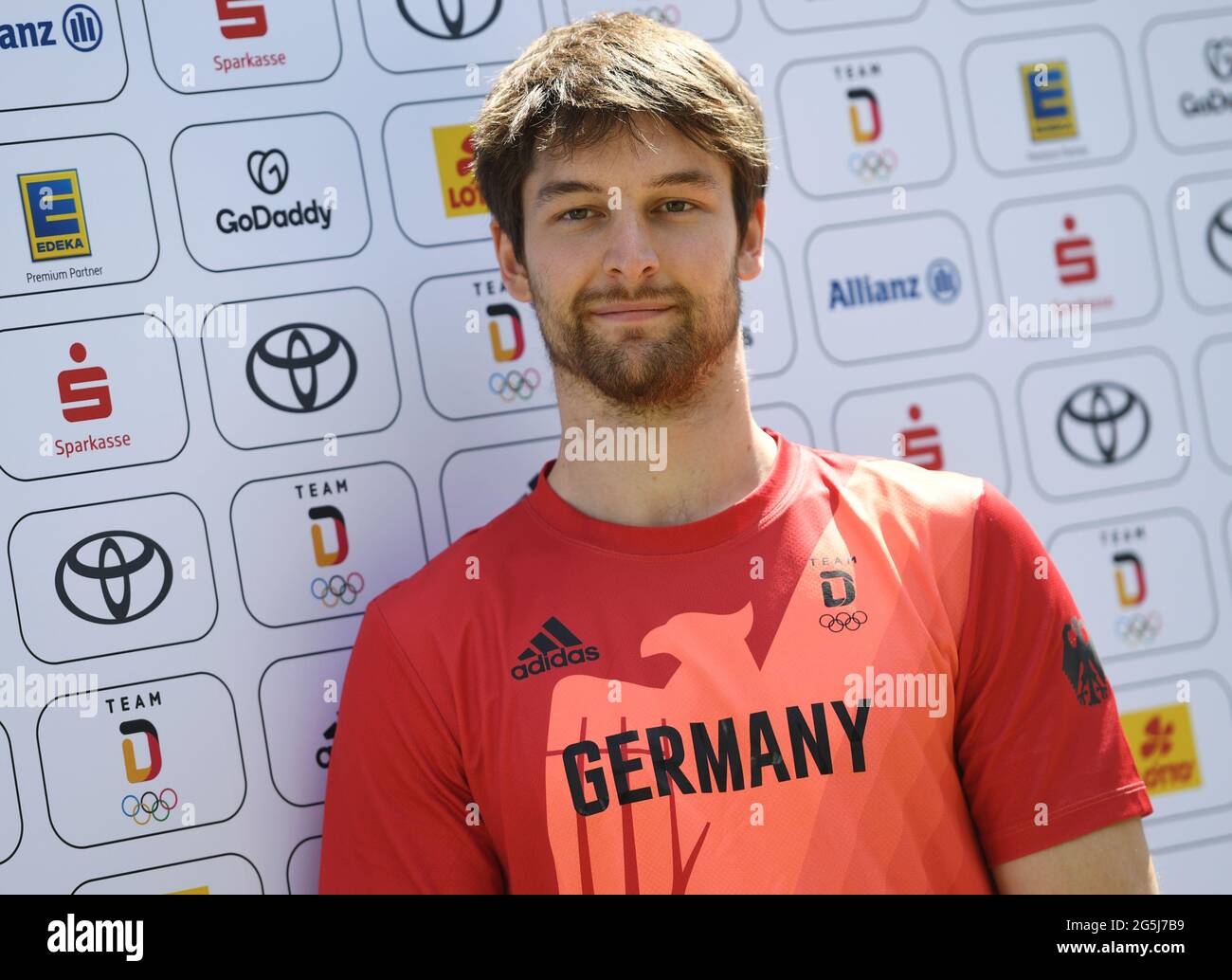 Munich, Germany. 28th June, 2021. Sport climber Jan Hojer wears a new T ...