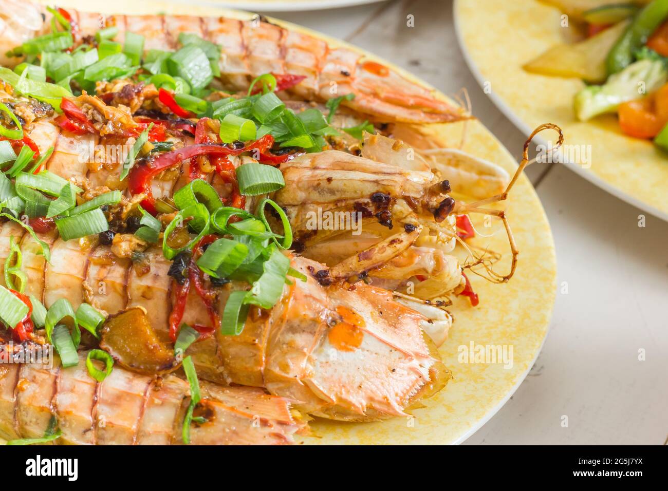 Asian style cooked mantis (Stomatopoda) shrimp with spring onion and ...