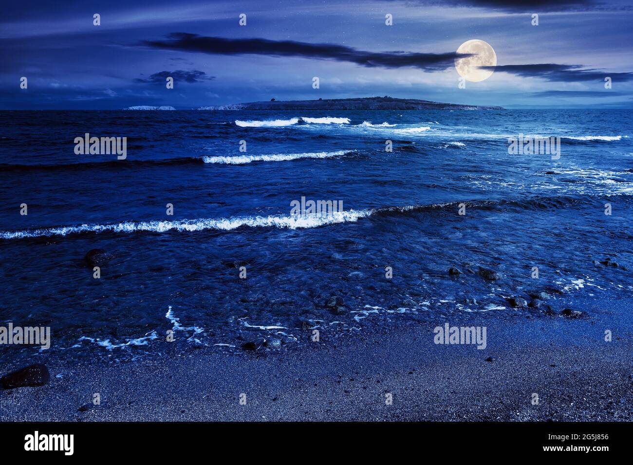 seascape at night. wonderful scenery with islands in full moon light ...