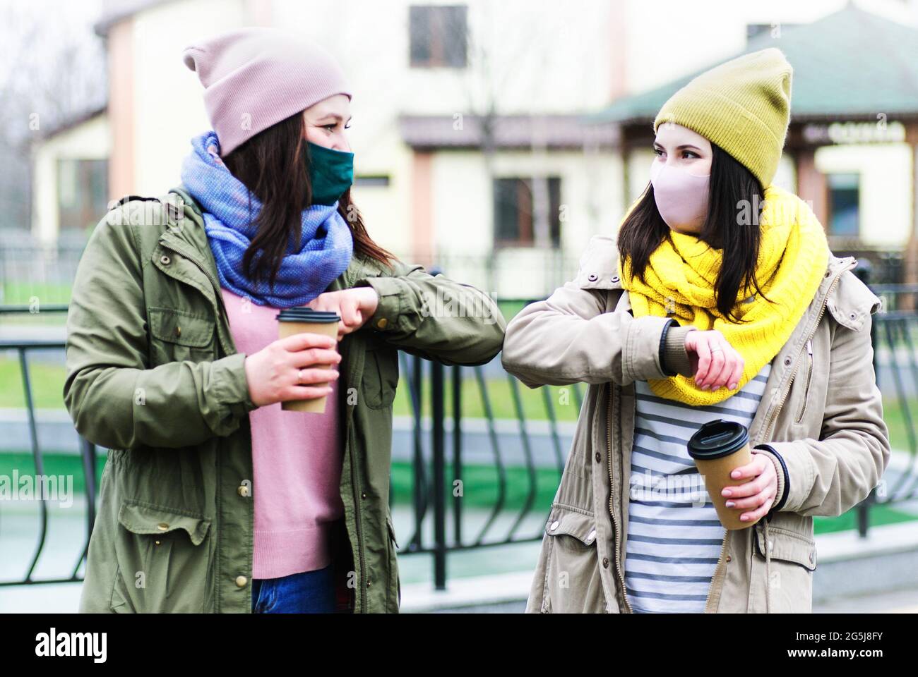 Elbow touching greeting hi-res stock photography and images - Alamy