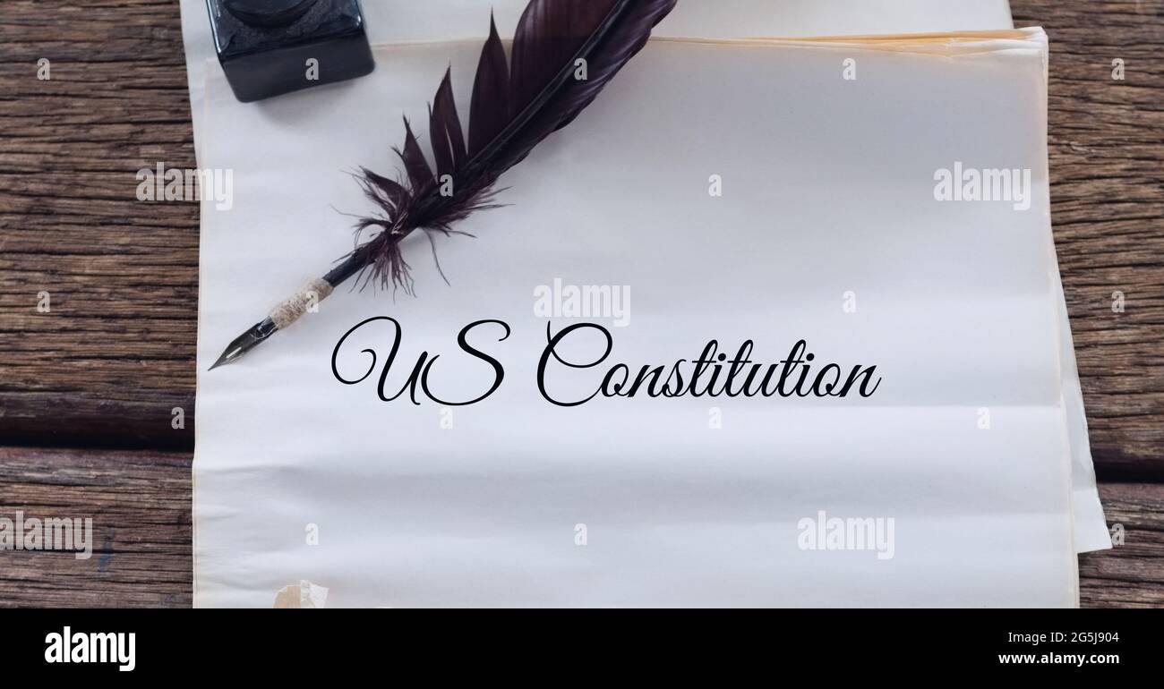 Composition of text us constitution, with quill pen and inkwell on ...