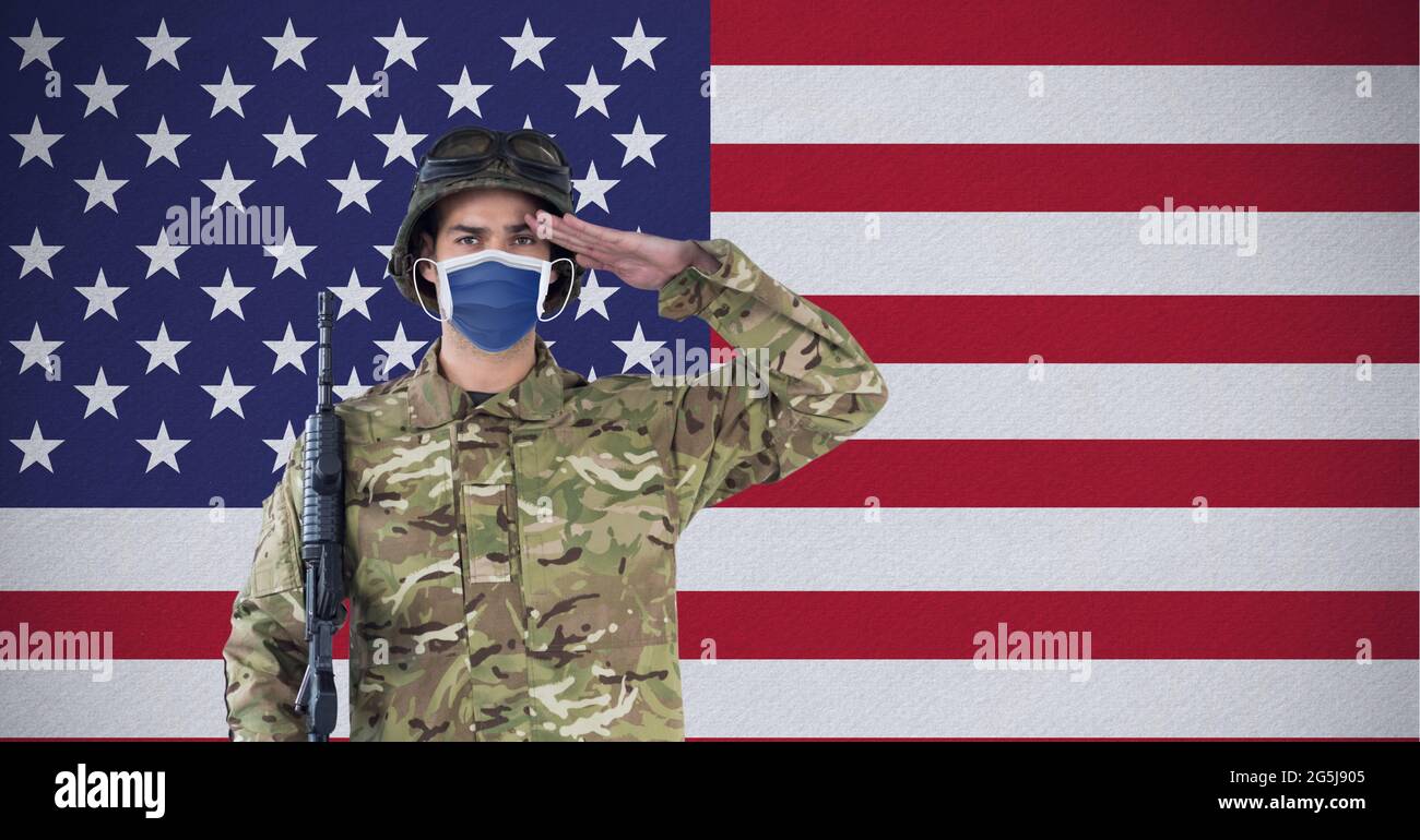 Composition of saluting male soldier wearing face mask, against ...